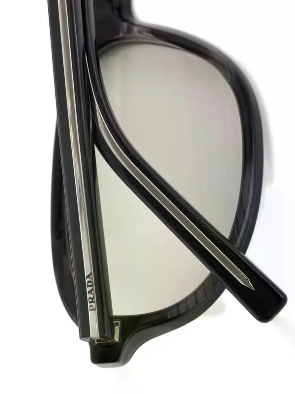 Prada Sunglasses With The Iconic Metal Plaque