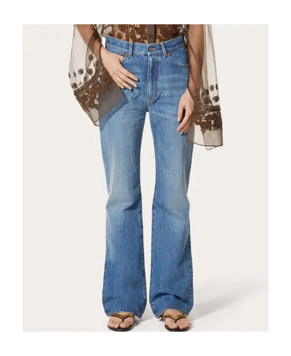 Valentino Garavani Washed Denim Jeans With Archive 1985 Print