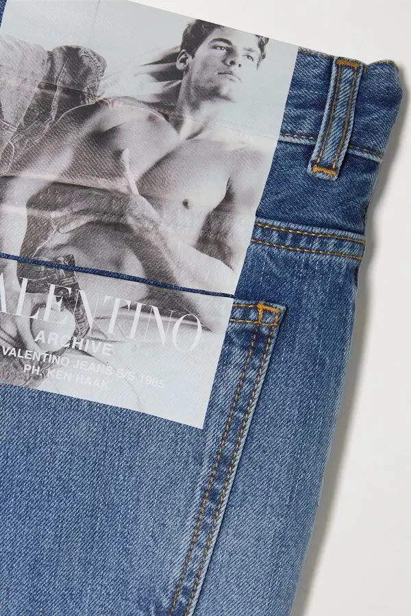 Valentino Garavani Washed Denim Jeans With Archive 1985 Print