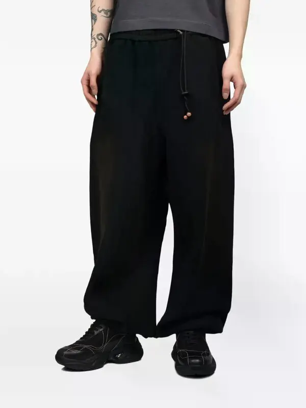 JIAN YE Gwai Washed-effect Track Pants