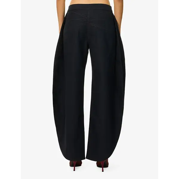 Alaïa Petal Curved-leg Wool Denim Trousers