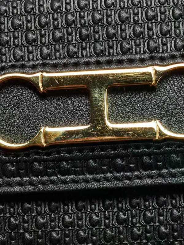 Carolina Herrera Initials Insignia Monogram-embossed Clutch Bag