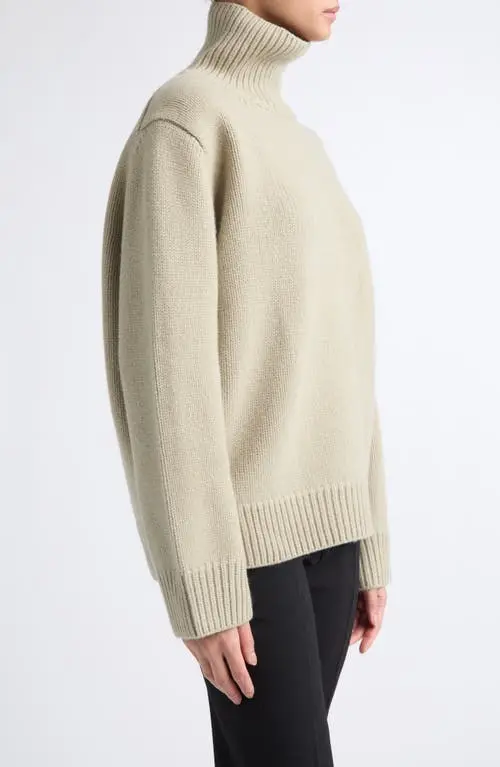 TOTEME Oversized Lambswool Turtleneck Sweater