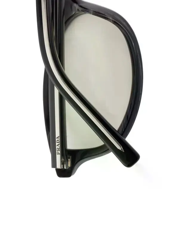 Prada Sunglasses With The Iconic Metal Plaque