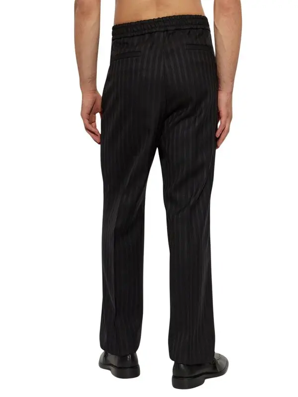 Versace Pleated Monogram Pants By