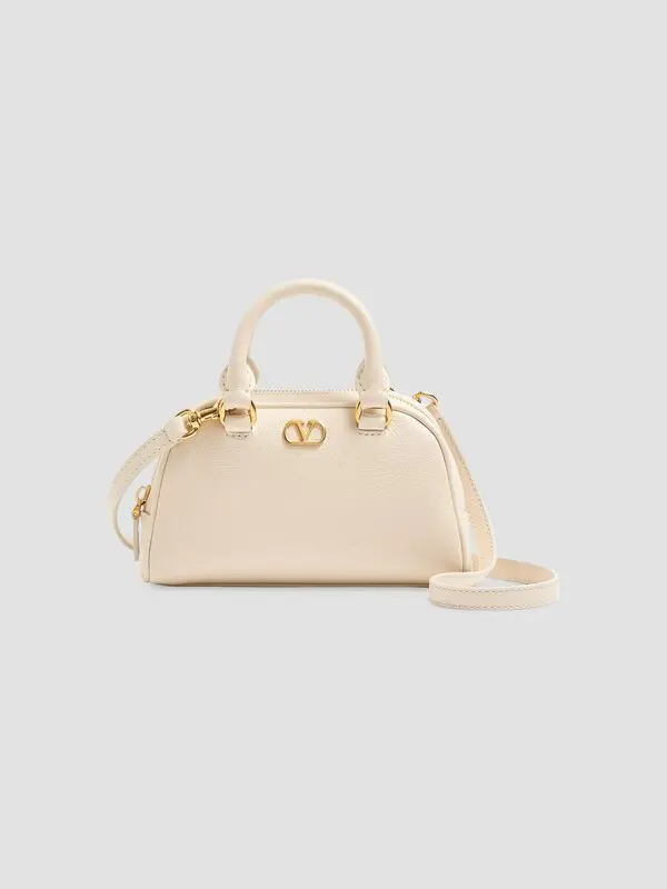 Valentino Garavani Vlogo Signature Mini Bowling Bag In Grainy Calfskin - Light Ivory