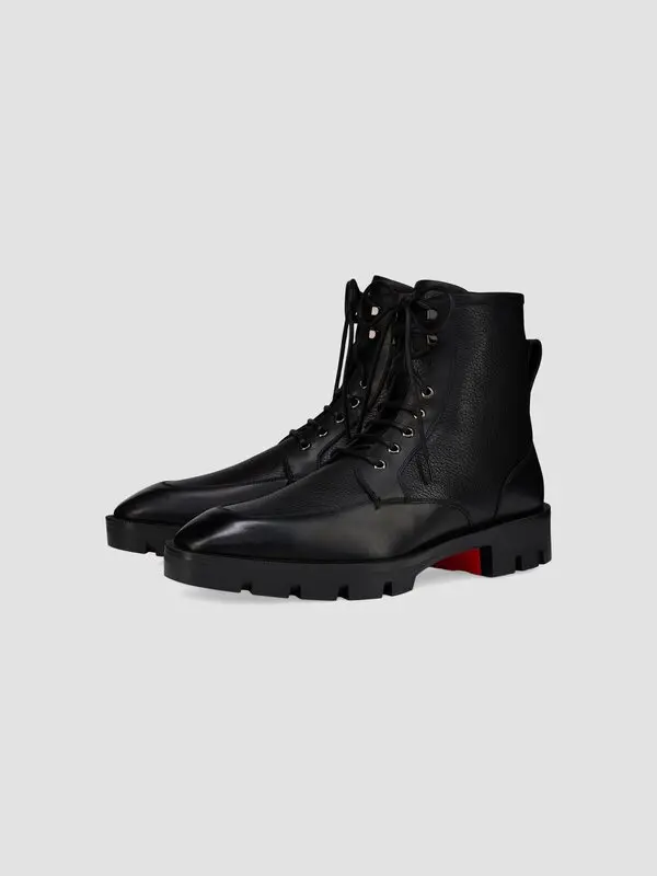 CHRISTIAN LOUBOUTIN Caracolo Lion Leather Boots