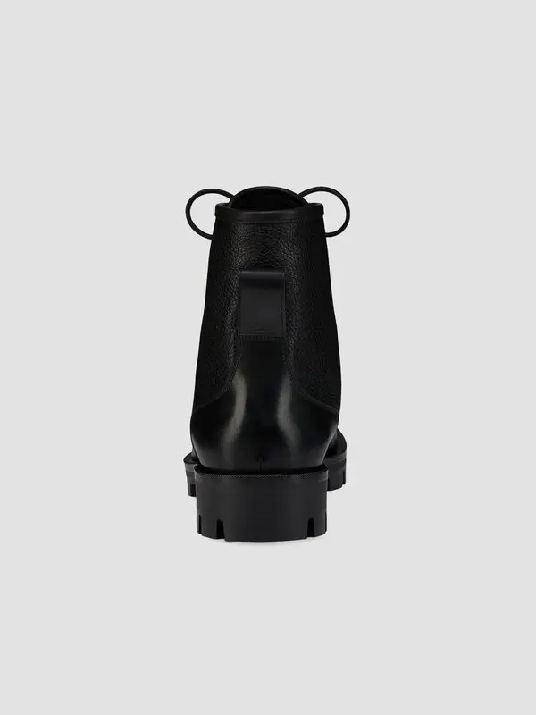 CHRISTIAN LOUBOUTIN Caracolo Lion Leather Boots