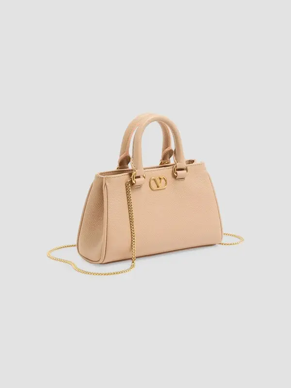 Valentino Garavani Mini Vlogo Signature Top Handle Bag In Grainy Calfskin - Beige