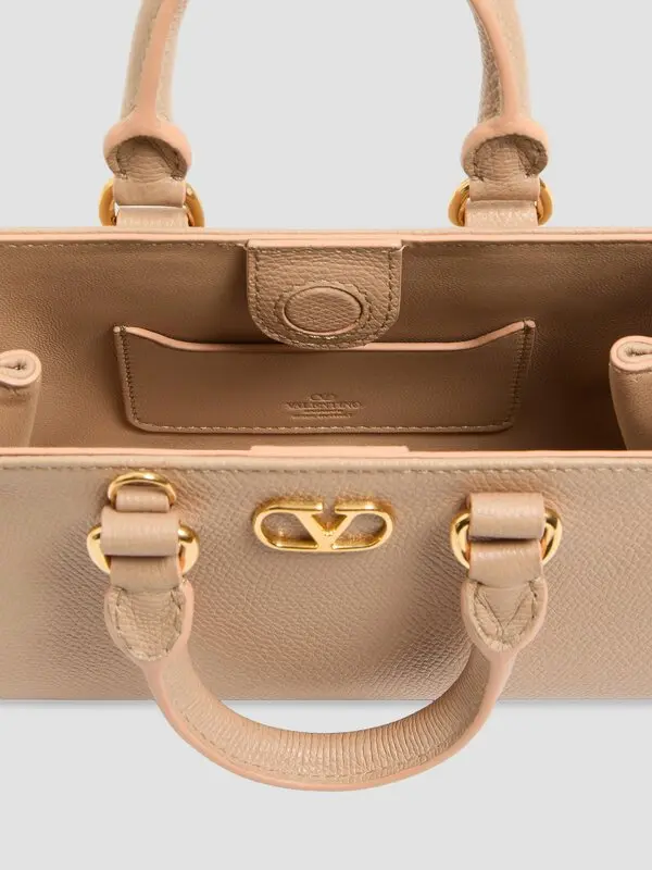 Valentino Garavani Mini Vlogo Signature Top Handle Bag In Grainy Calfskin - Beige