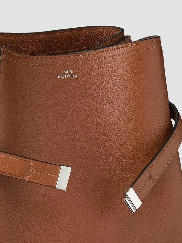 TOTEME Belted Grained-leather Bucket Bag - Sienna