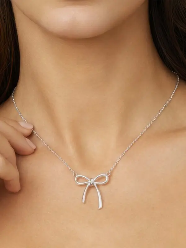 ORADINA Wrap Me Up Bow Pendant Necklace In Sterling