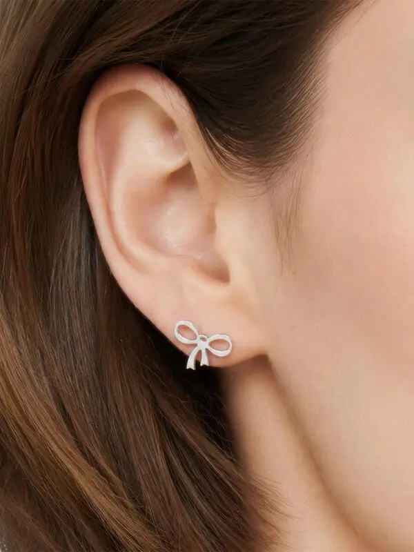 ORADINA Wrap Me Up Bow Studs In Sterling
