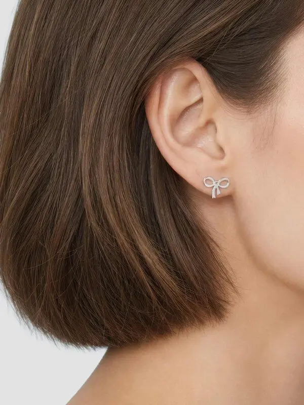 ORADINA Wrap Me Up Bow Studs In Sterling