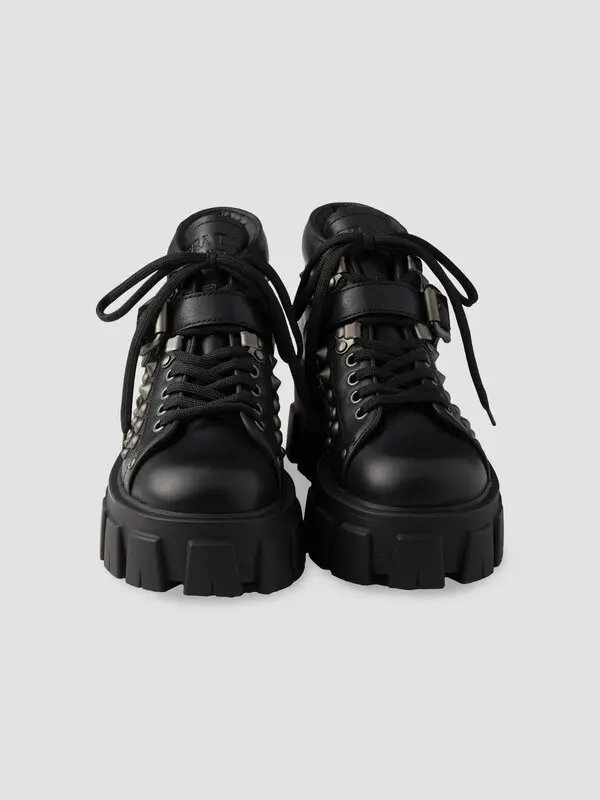 Prada Monolith Studded Leather Booties