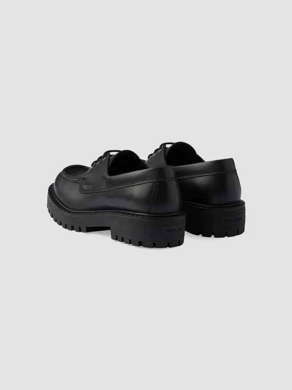 Prada Laced Leather Loafers