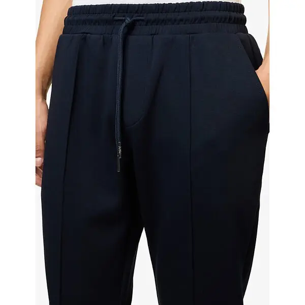 ARNE Interlock Tapered Woven Jogging Bottoms