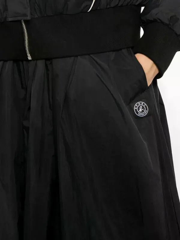 AGNES B. Pleated Midi Skirt