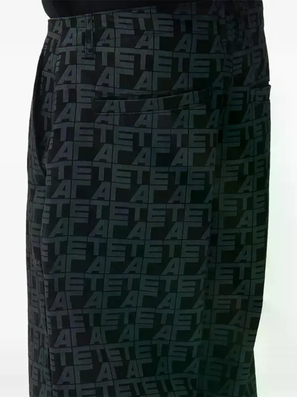 ARTE ANTWERP Monogram-print Jeans