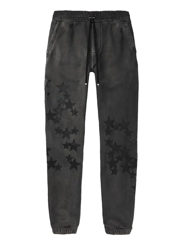Amiri Pigment Spray Star Tapered Leather-trimmed Cotton-jersey Sweatpants - Black
