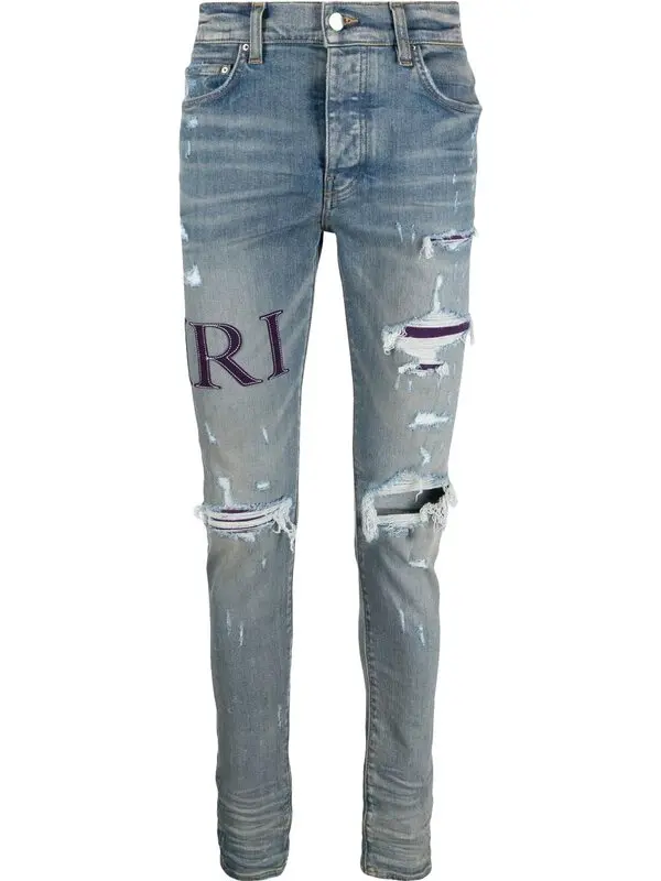 Amiri Ripped-knee Logo-print Skinny Jeans - Blue