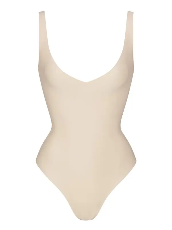 SKIMS Unlined Plunge Thong Bodysuit - Sand