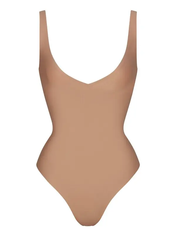 SKIMS Unlined Plunge Thong Bodysuit - Sienna
