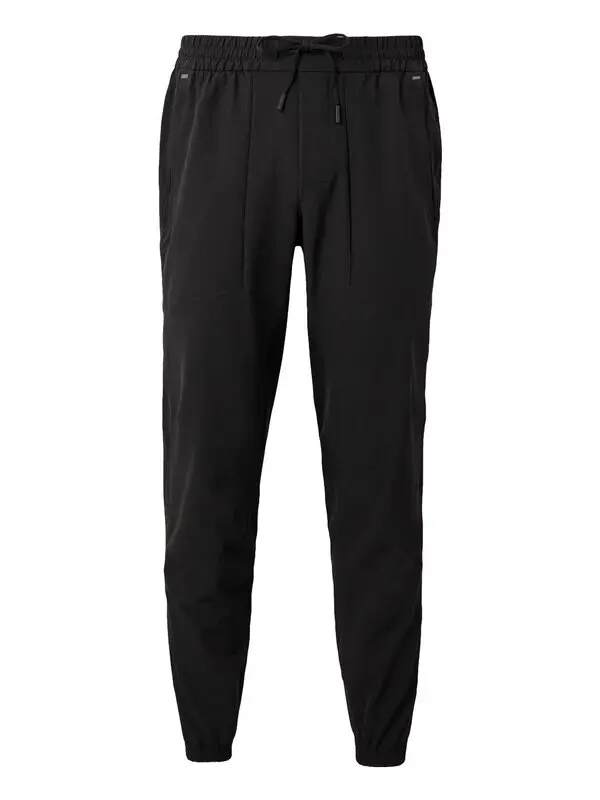 Lululemon License To Train Slim-fit Tapered Stretch Recycled-shell Track Pants - Black