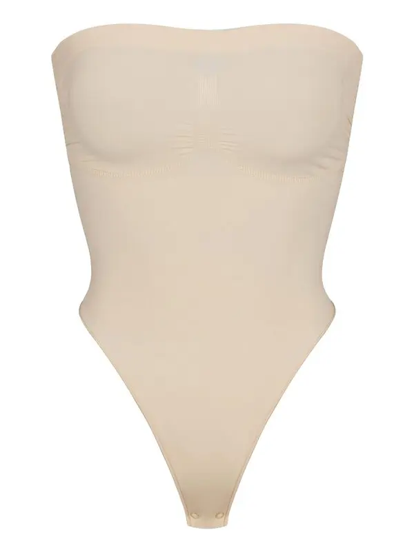 SKIMS Seamless Sculpt Strapless Thong Bodysuit - Sand