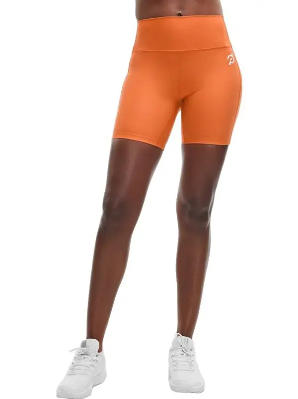 PELOTON Cadent 7" High Rise Pocket Bike Short - Tangerine