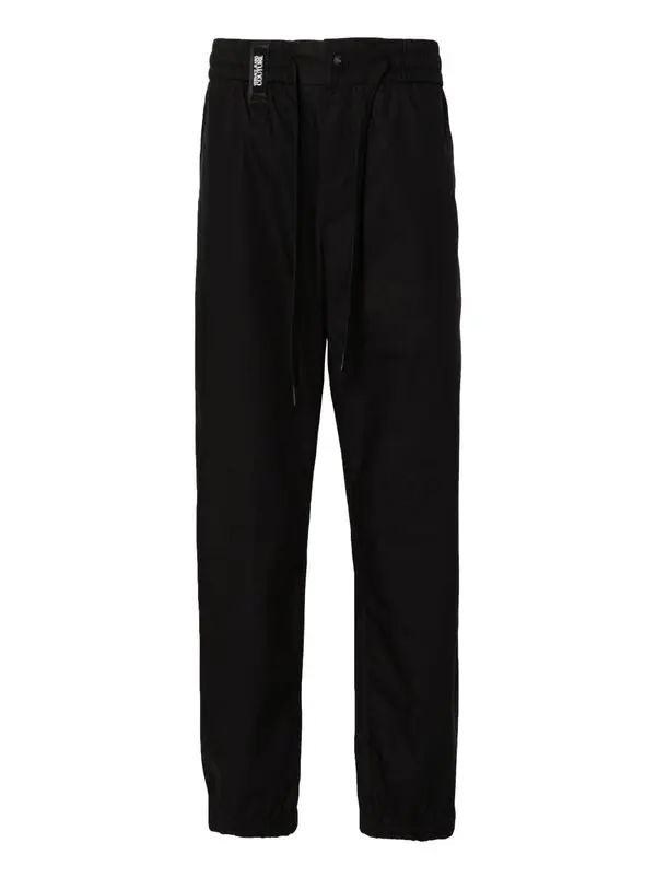 Versace Tapered-leg Trousers With Logo Strap - Black