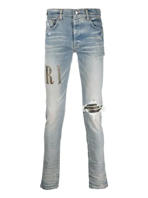 Amiri Logo Distressed Skinny Jeans - Indigo Blue