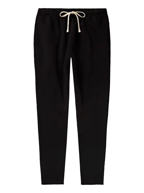 LES TIEN Tapered Garment-dyed Cotton-jersey Sweatpants - Black