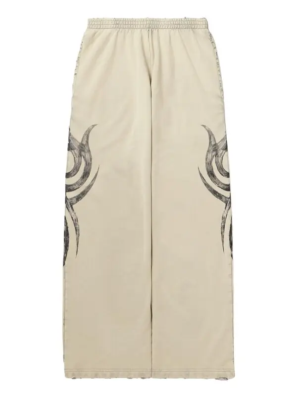 Balenciaga Wide-leg Distressed Printed Cotton-jersey Sweatpants - Neutrals