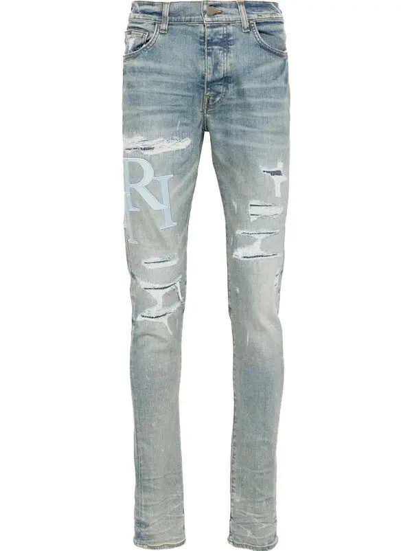 Amiri Staggered Logo Jean - Clay Indigo