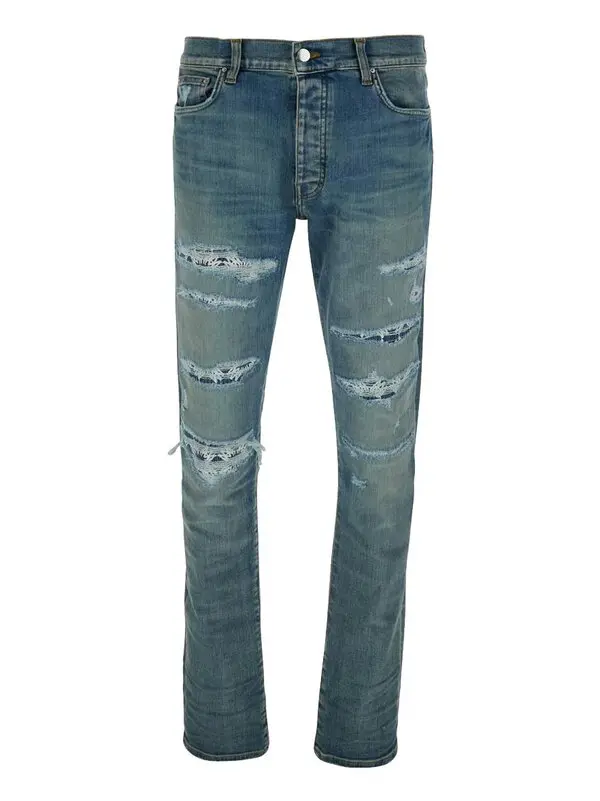 Amiri Jeans With Ripped Details And Logo Patch - Blue