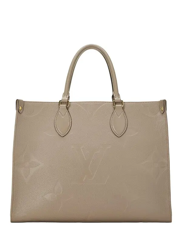 LOUIS VUITTON Giant Monogram Empreinte On The Go Mm - Beige
