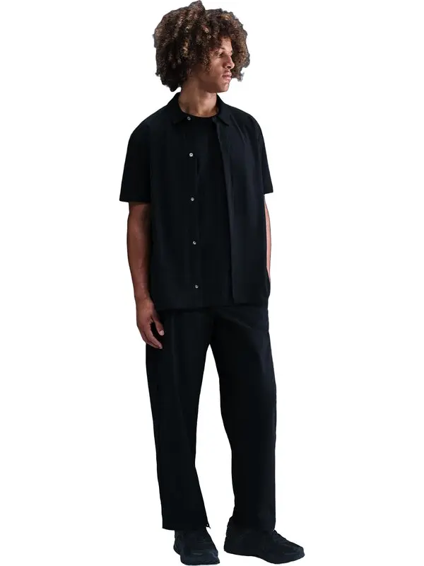 Nike 24.7 Perfectstretch Dri-fit Loose-fit Chino Trousers - Black