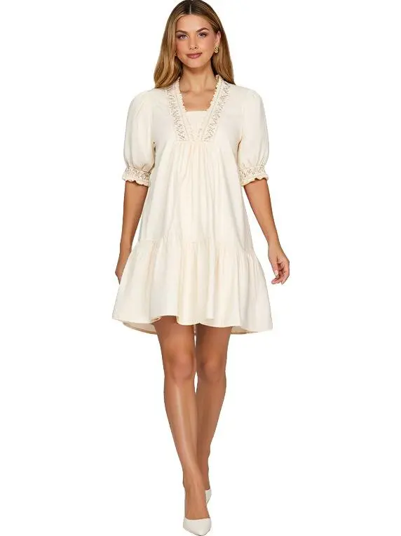 MODENAIRE Smocked Sleeve Mini Dress With Embroidered Neckline And Tiered Hem - Ivory