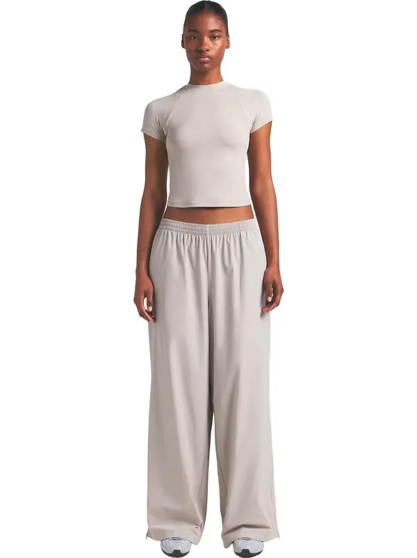 SKIMS X Nike Oversized Track Pants - Stone