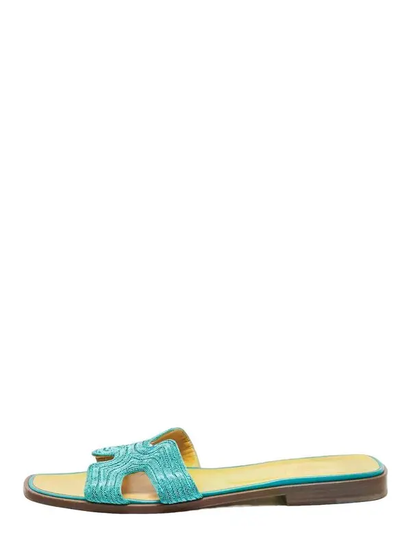 Hermès Oran Twisted-effect Flat Sandals - Yellow
