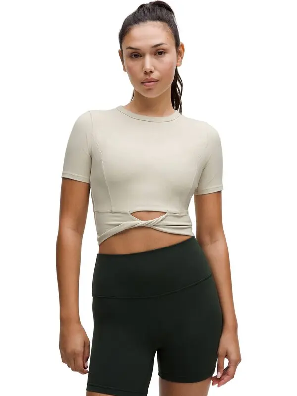 Lululemon Cropped Nulu Twist-hem Short-sleeve Shirt - Bone