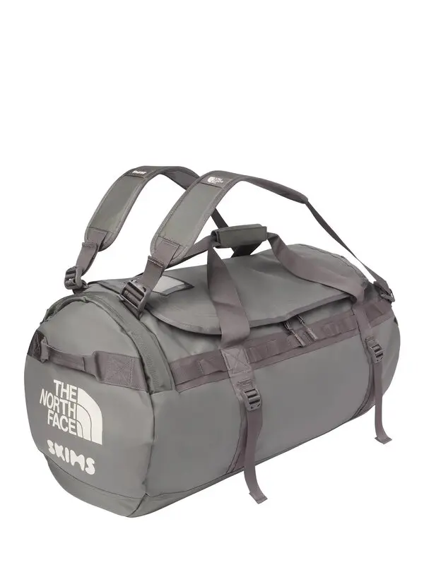 SKIMS Base Camp Duffle Bag | The North Face X - Gunmetal