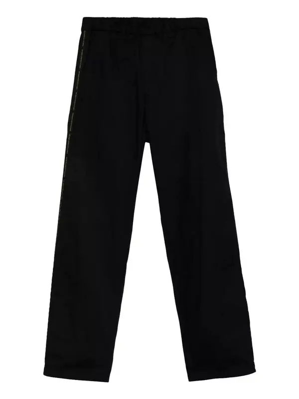 UNDERCOVERISM Logo Tape Trousers - Black