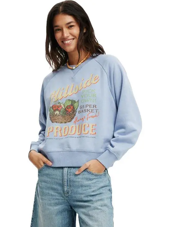 COTTON ON Classic Fleece Graphic Raglan Crew Sweatshirt - Hillside Produce Dusk Blue