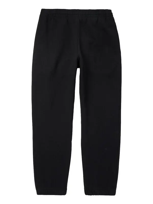 Burberry Tapered Logo-appliquéd Cotton-jersey Sweatpants - Black