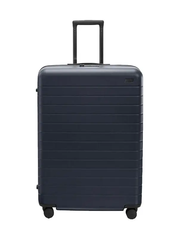 AWAY The Large Flex Suitcase - Navy Blue