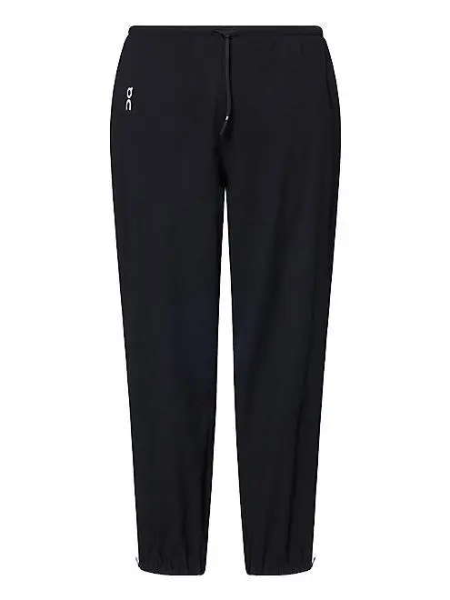 On Pace Tapered Woven Jogging Bottoms - Black