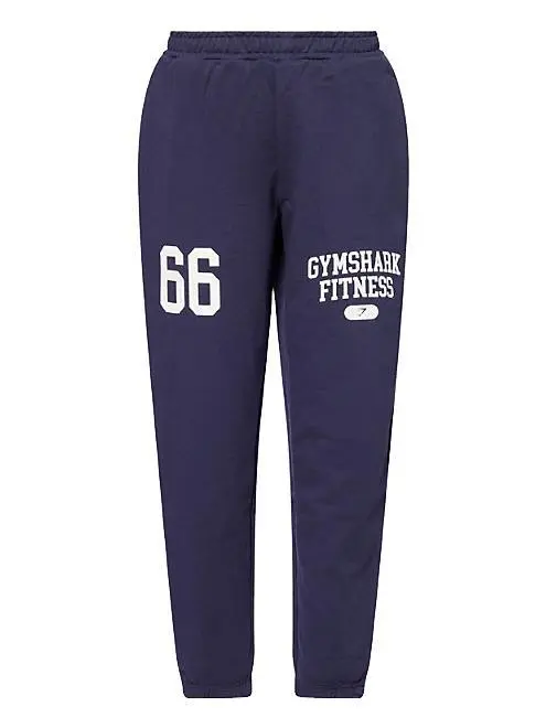 GYMSHARK Varsity Graphic Oversized Cotton-jersey Jogging Bottoms - Blue