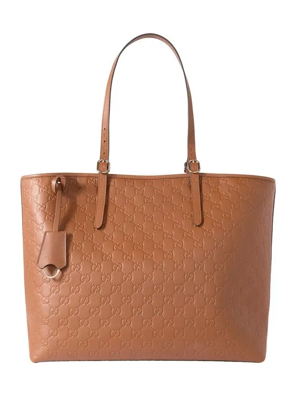 Gucci Gg Embossed Leather Tote - Brown